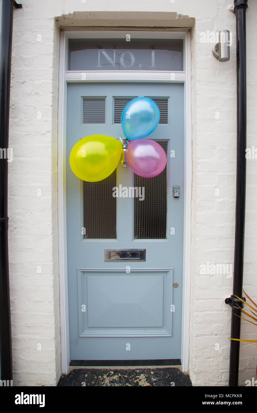 An English front door decorated with balloons for a birthday party ...