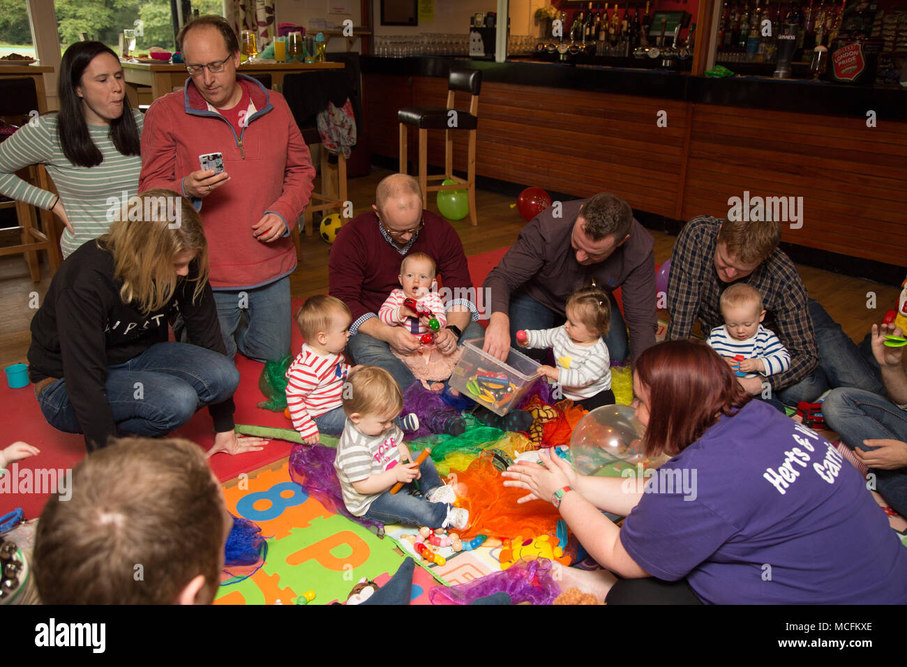 Father & Baby Group Stock Photo - Alamy
