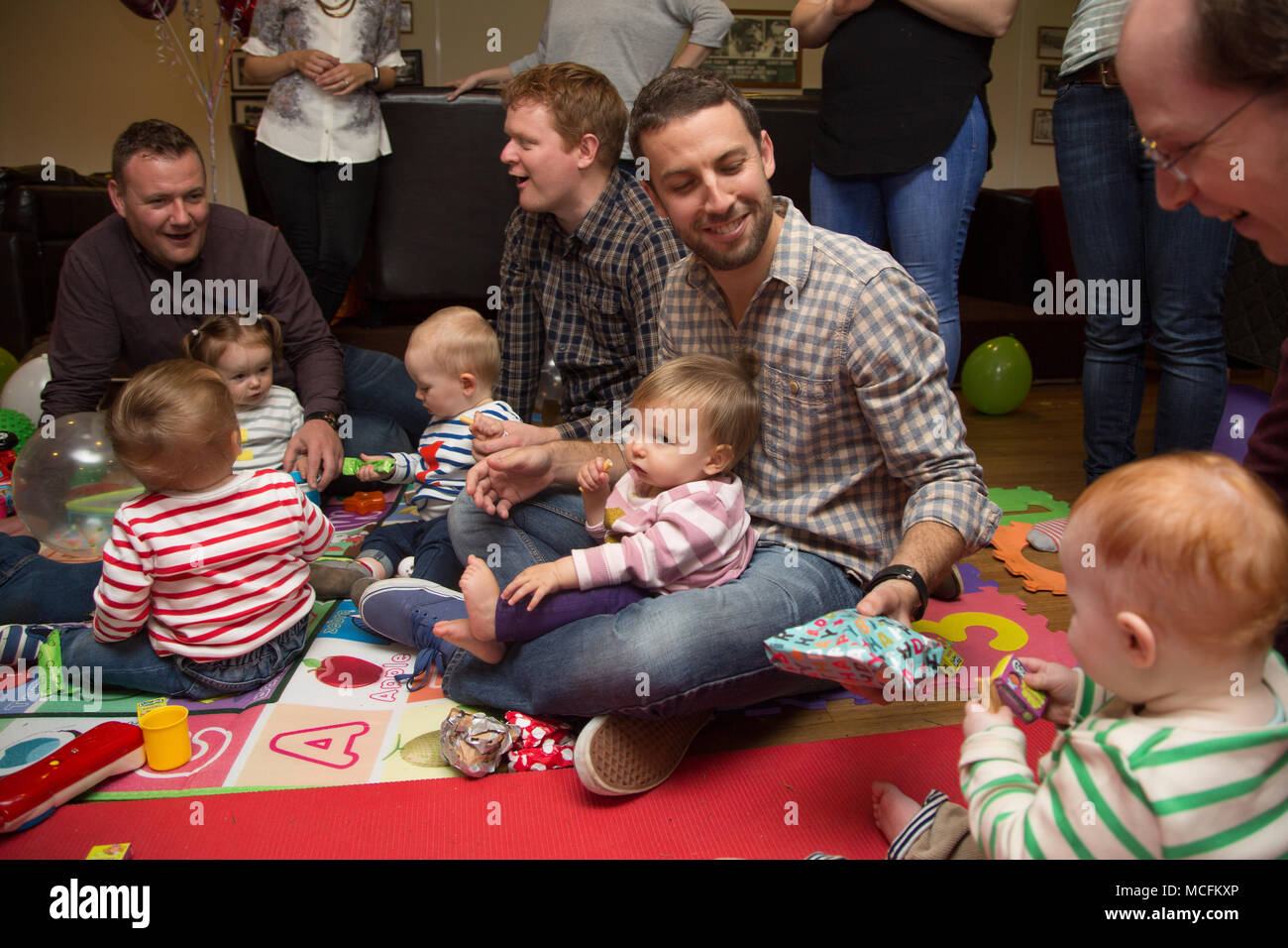 Father & Baby Group Stock Photo - Alamy