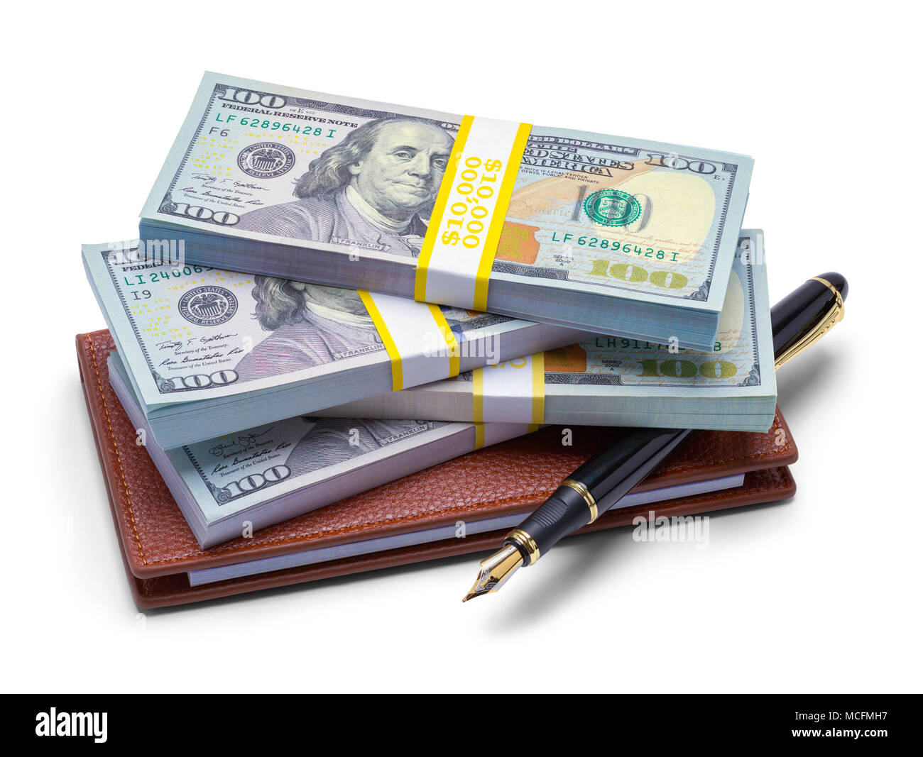 Checkbook on stack of bills hi-res stock photography and images - Alamy