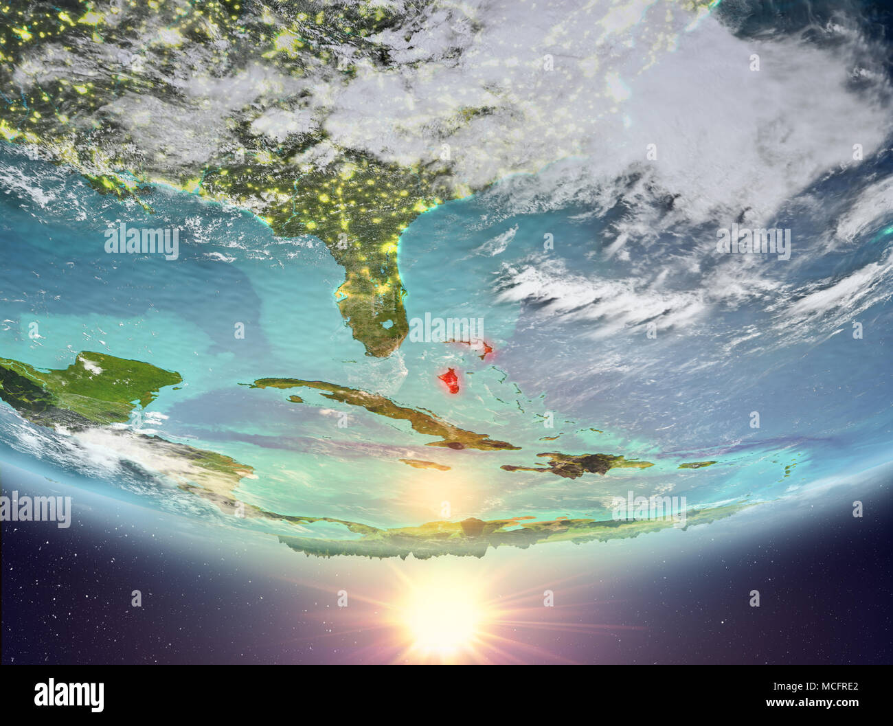 Bahamas during sunrise highlighted in red on planet Earth with clouds ...