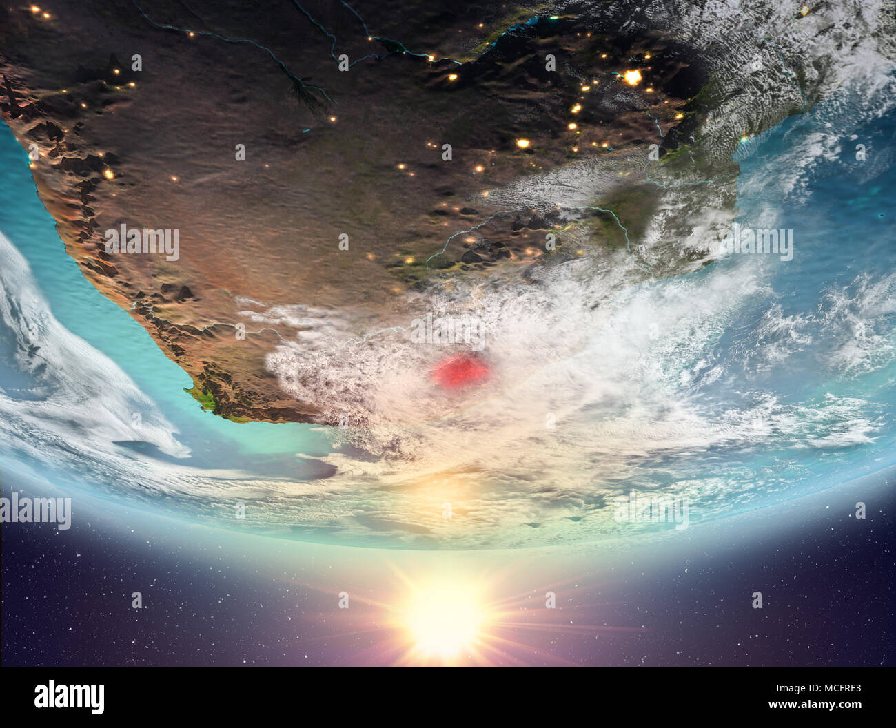Lesotho during sunrise highlighted in red on planet Earth with clouds ...