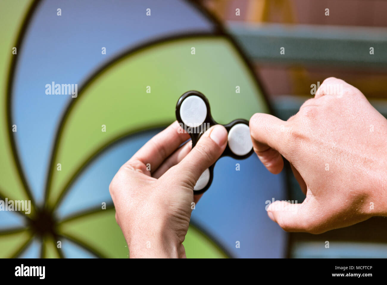 classic new trendy game for all. Hand spinner fidgeting hand toy Stock ...