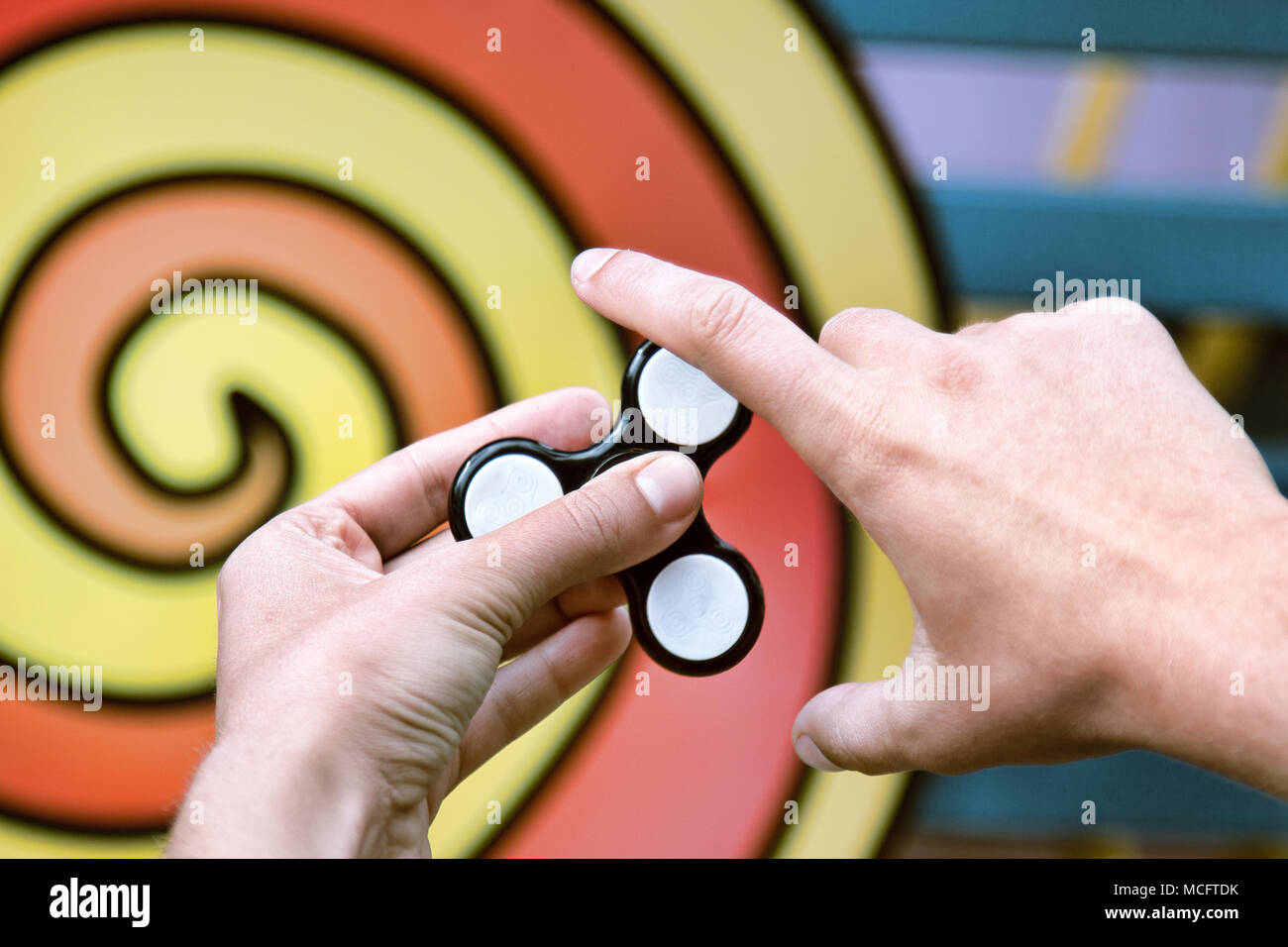 classic new trendy game for all. Hand spinner fidgeting hand toy Stock ...