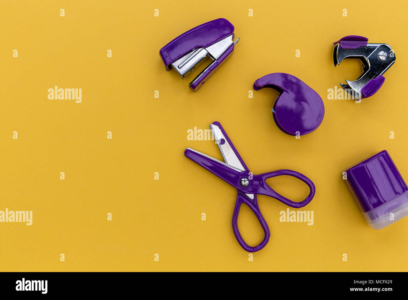 Stationery set on bright yellow background Stock Photo - Alamy