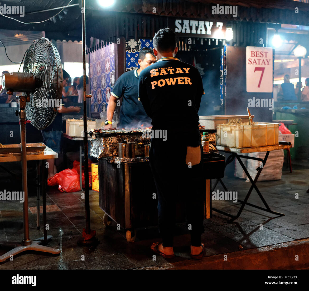 Diners, local, expat and tourist, at Lau Pa Sat, the Satay Club, in the ...
