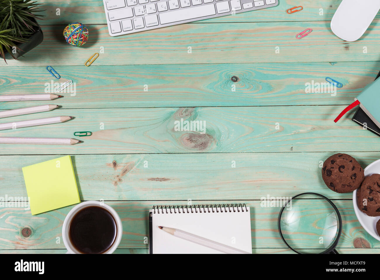 Office table desk with set of colorful supplies Stock Photo - Alamy