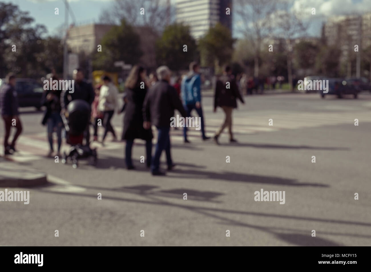 Blurred image of people moving in crowded city street Stock Photo - Alamy