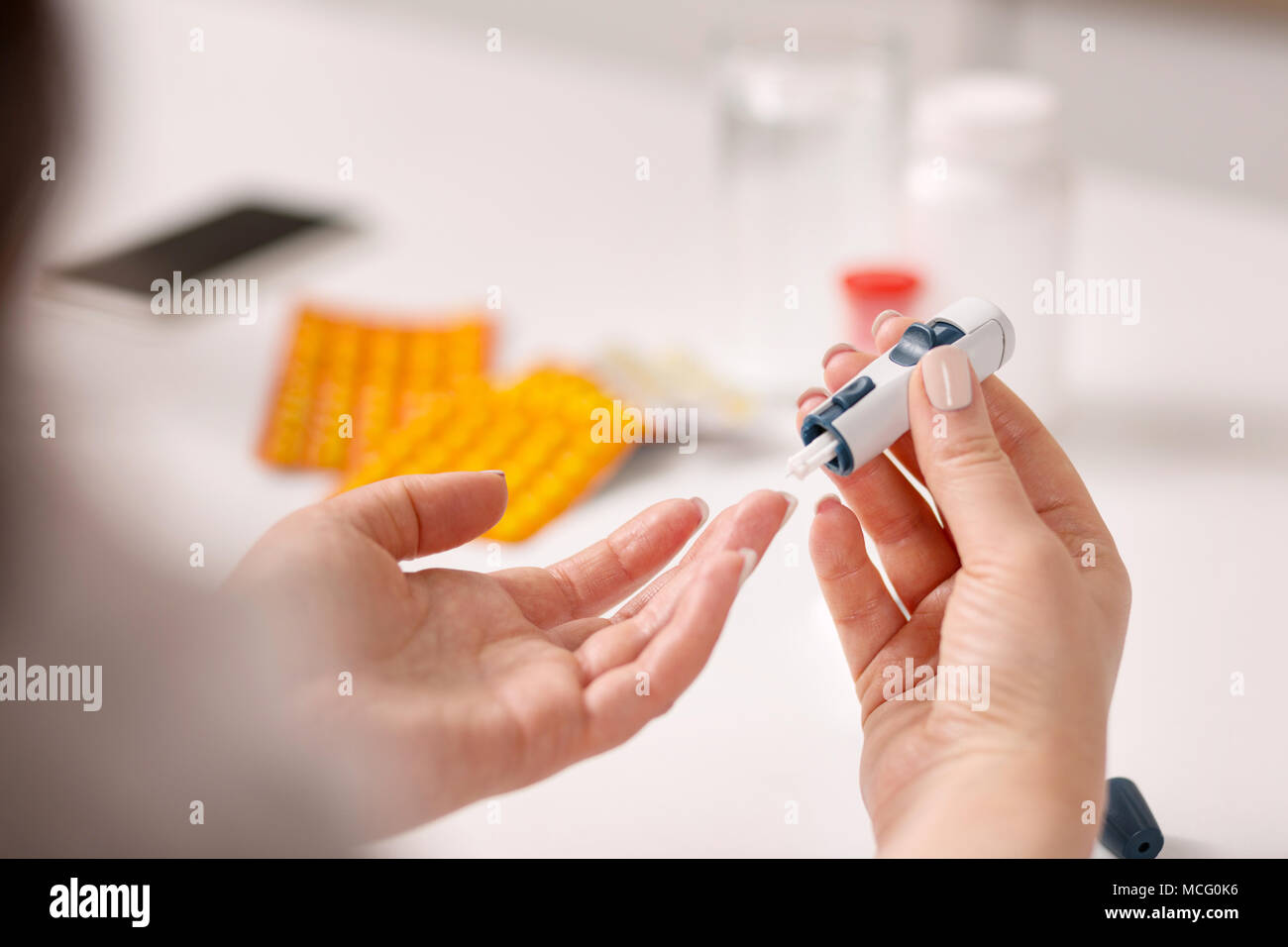Beautiful female hands conducting test Stock Photo - Alamy