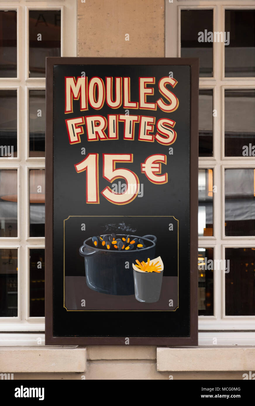 A sign for muscles and french fries outside a Paris restaurant. Paris ...