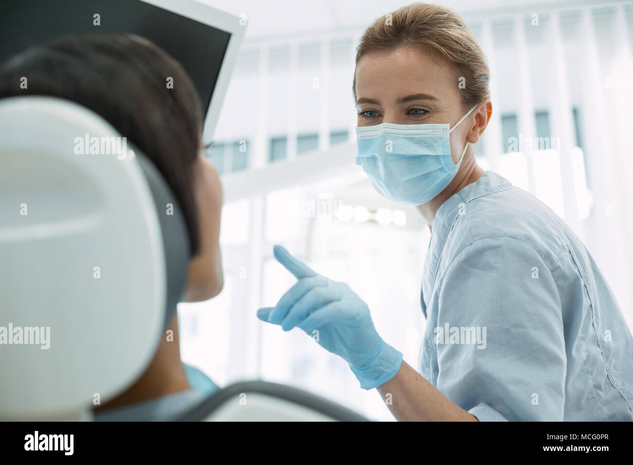 Determined pointing at a bad tooth Stock Photo - Alamy