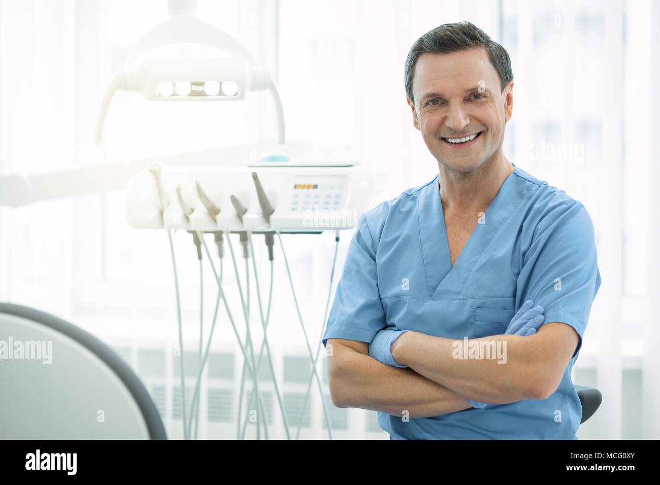 Dentist standing hi-res stock photography and images - Alamy