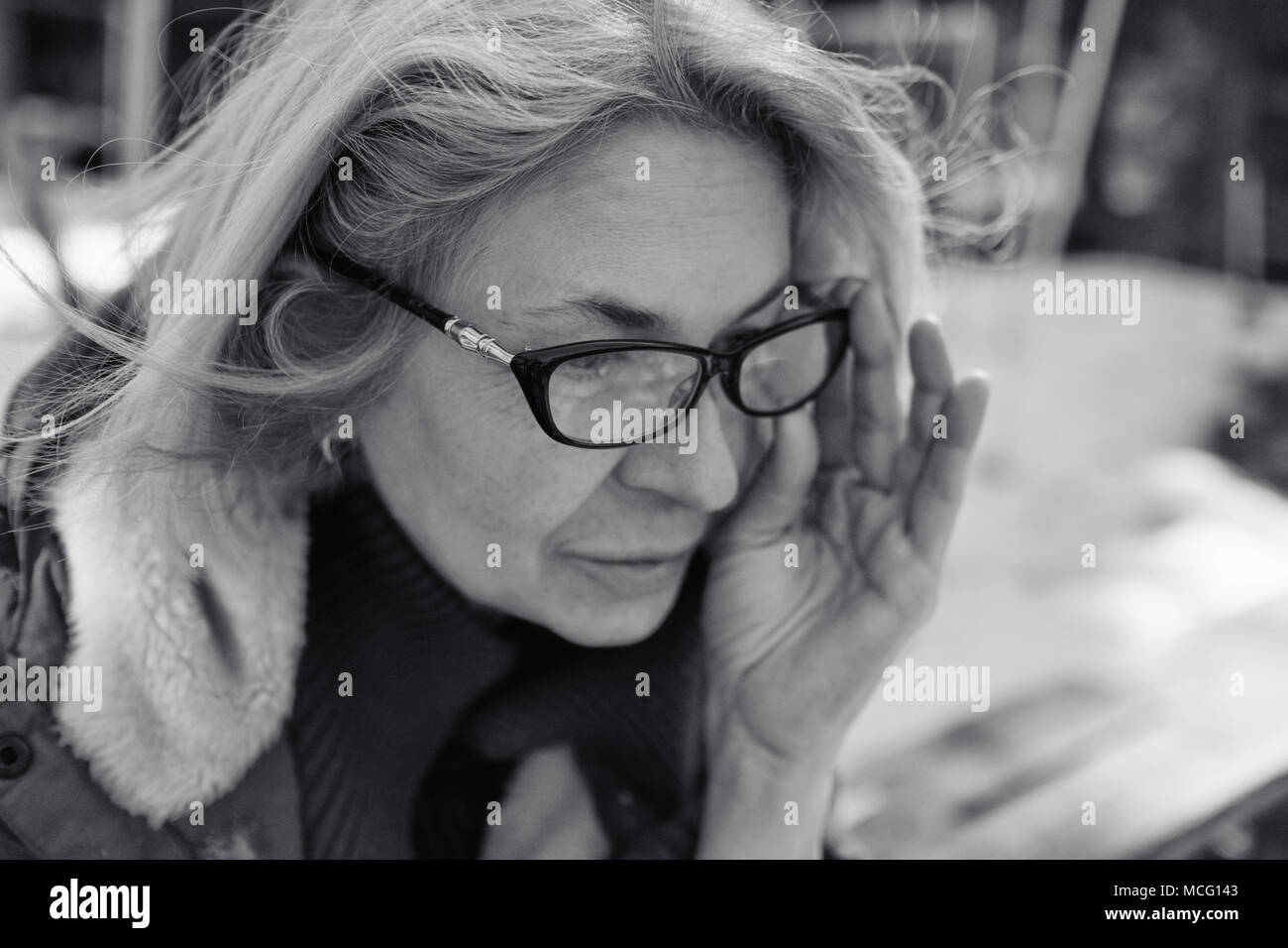 Woman wearing black glasses hi-res stock photography and images - Alamy