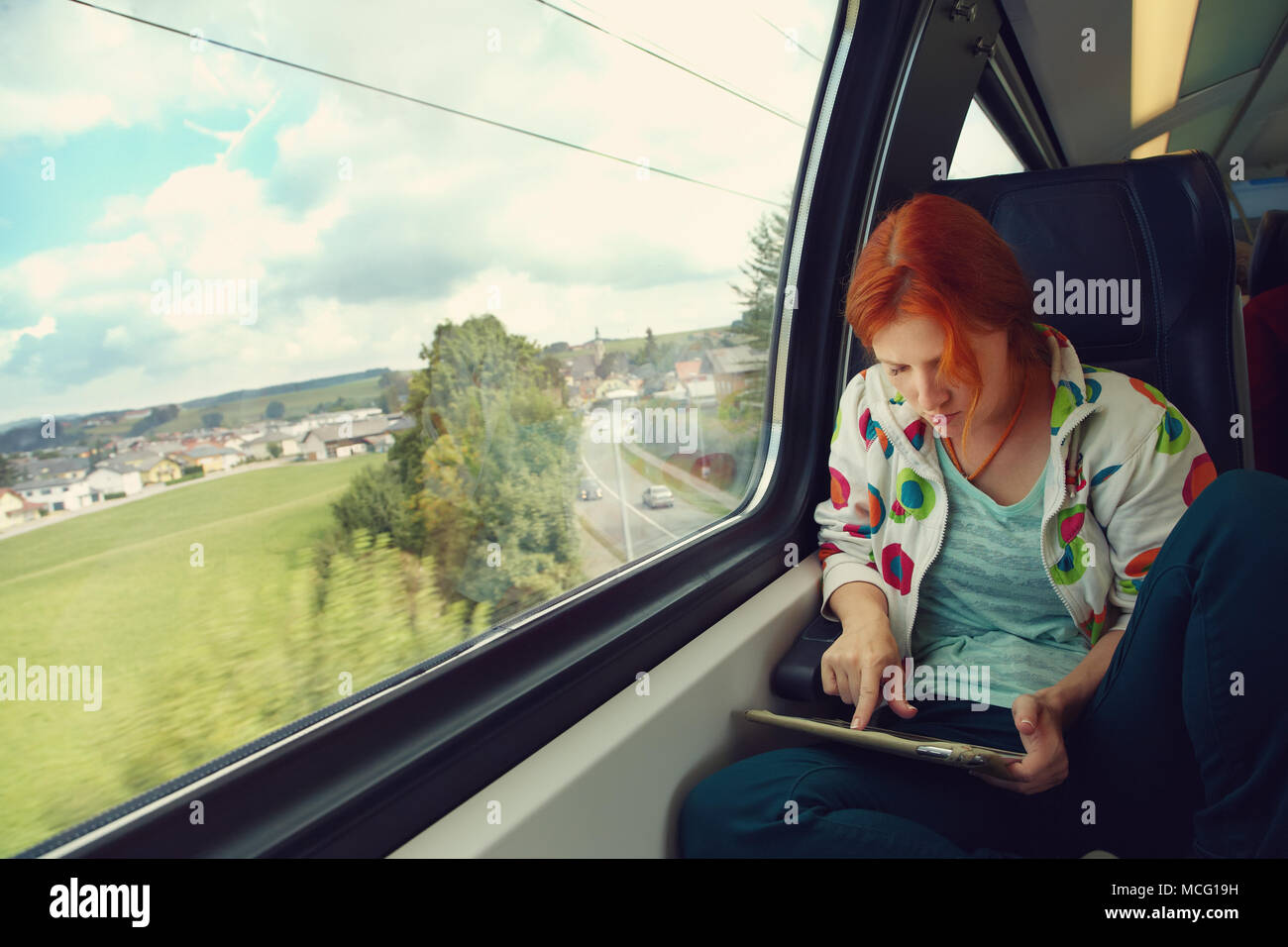 woman riding on a train Stock Photo - Alamy