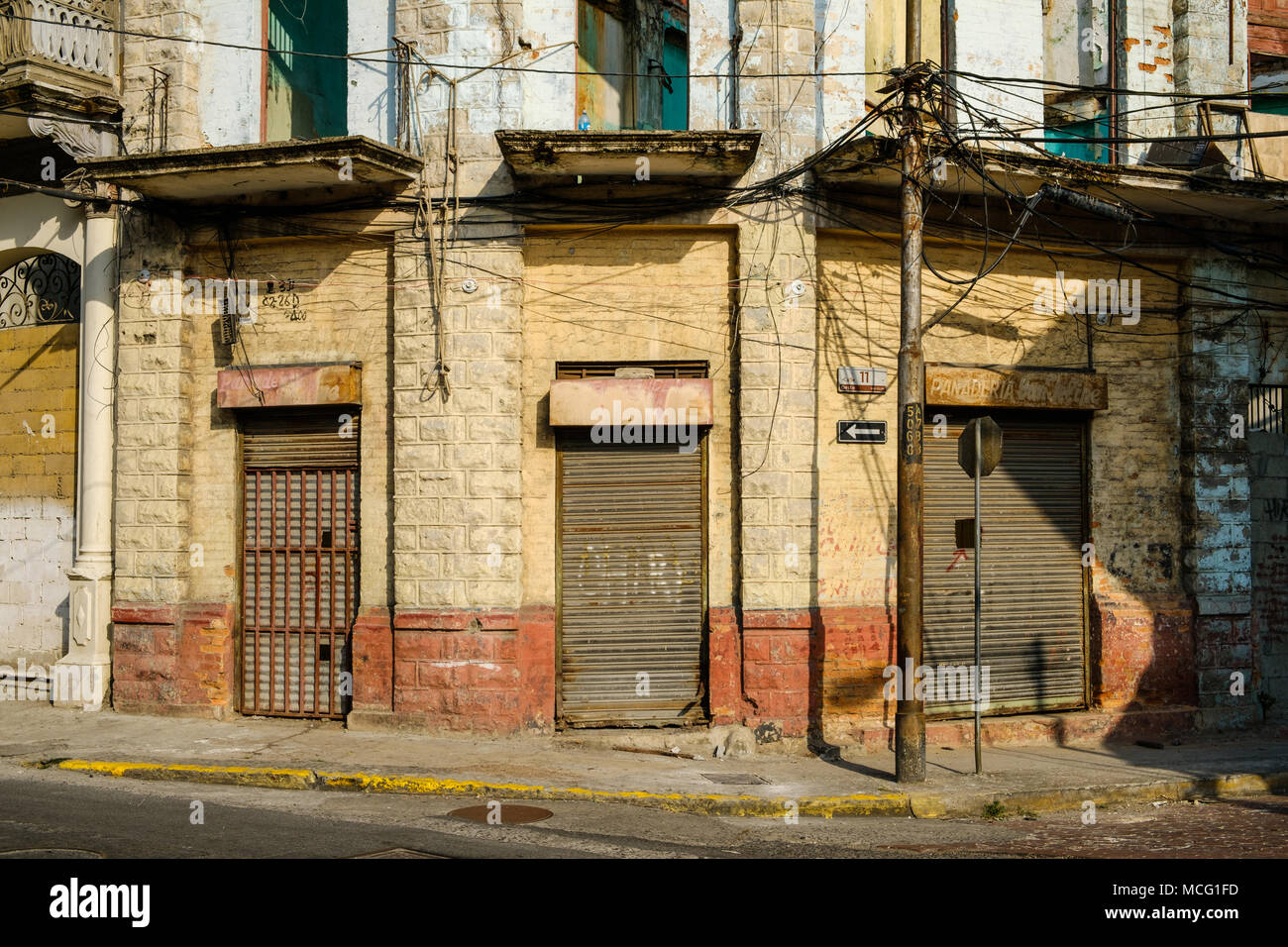 vintage storefront, closed shutters, shop exterior in old town Stock ...