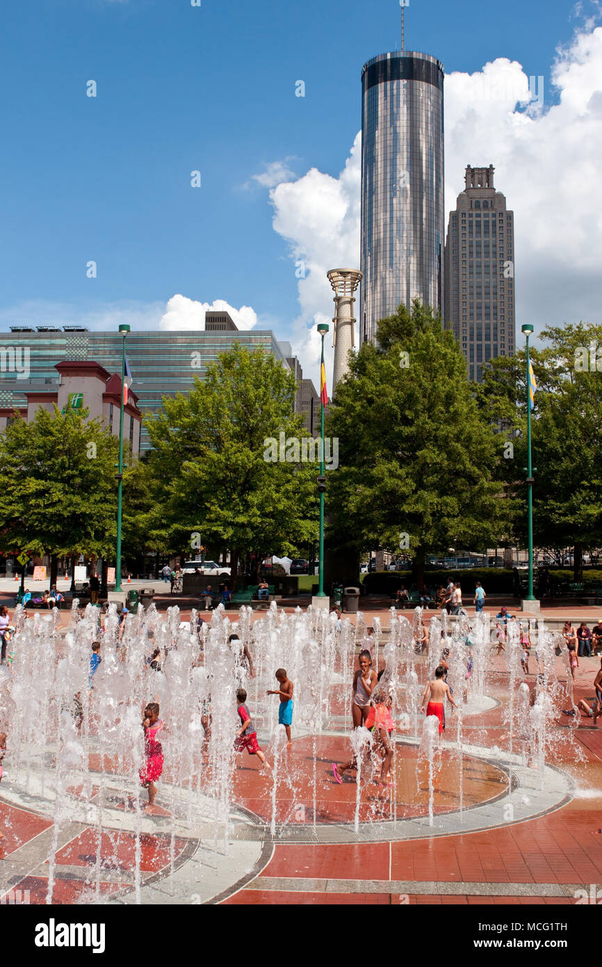 Atlanta, GA, USA - September 6, 2014: Kids get wet playing in the ...