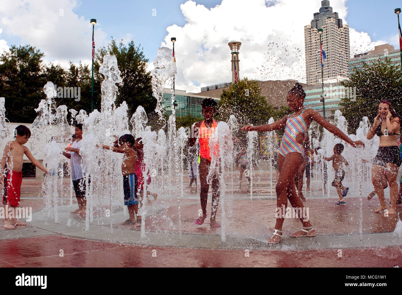 Getting wet fountain water hi-res stock photography and images - Alamy