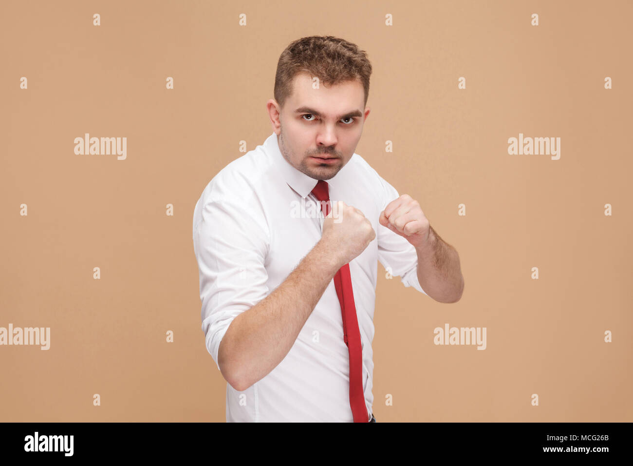 Danger and strong businessman showing boxing sign and ready to fight ...