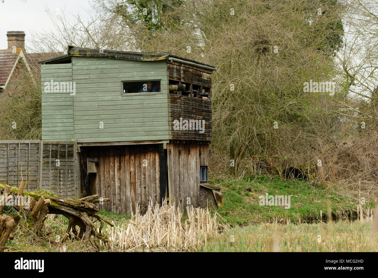Kingfisher Hide with wildlife photographer's lenses in Rye Meads RSPB ...