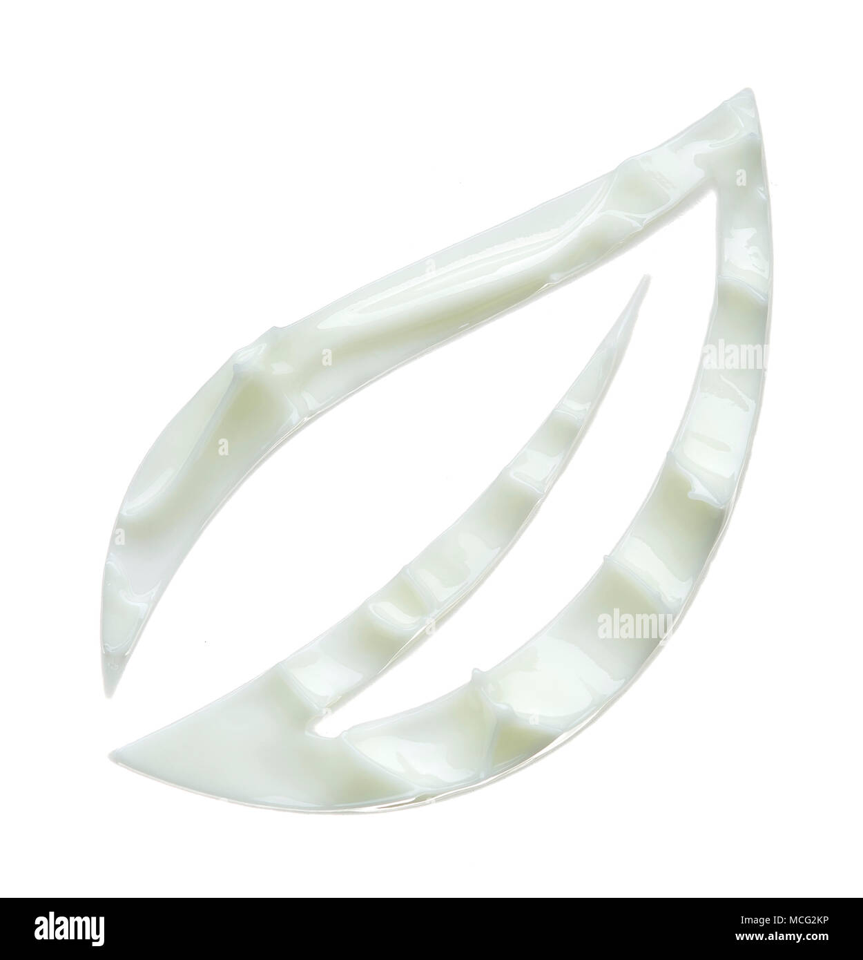 Exclusive textures of cosmetic products in leaf form on white ...