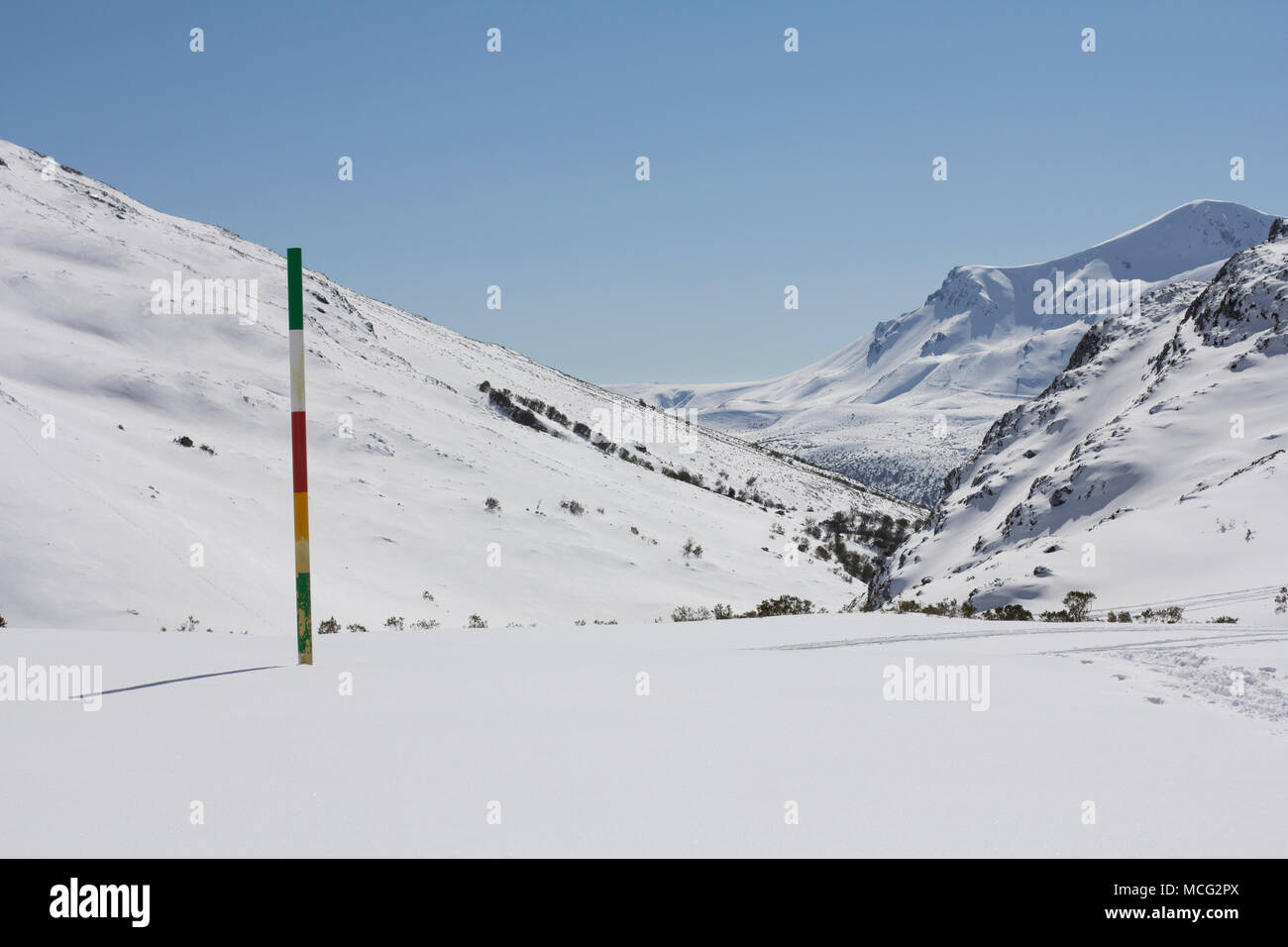 Colorful signpost for deep snow Stock Photo - Alamy