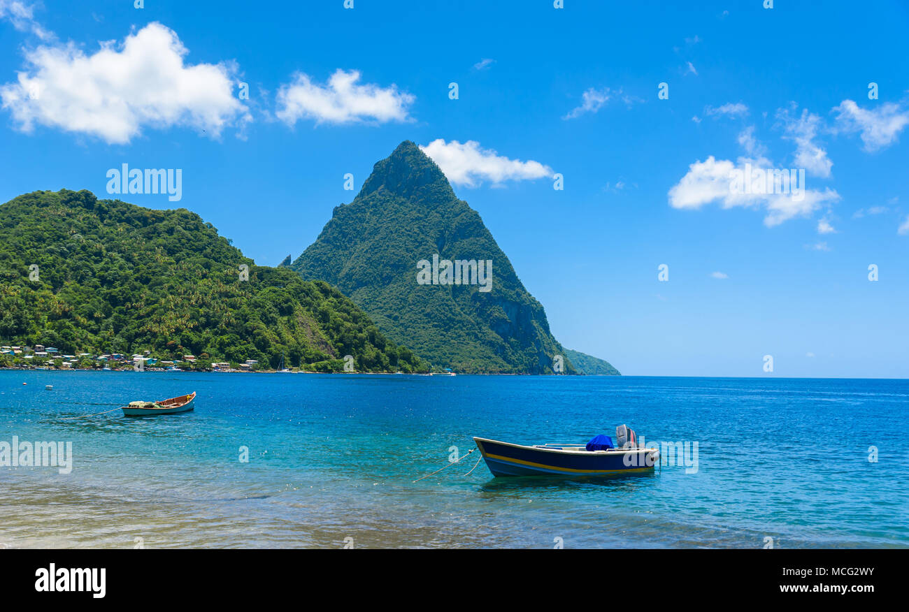 Paradise beach at Soufriere Bay with view to Piton at small town ...