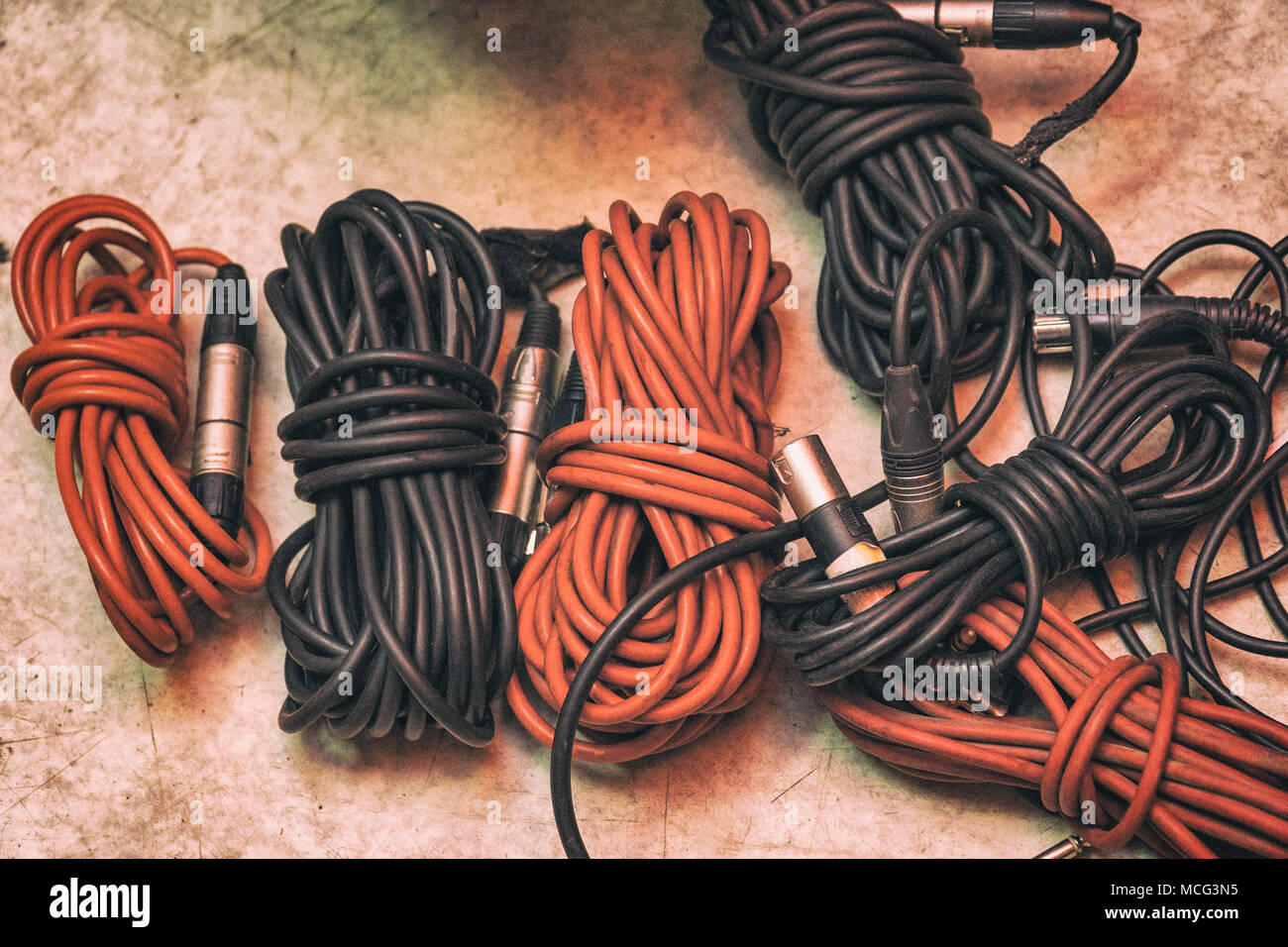 Audio cables for musical instruments and microphones Stock Photo - Alamy