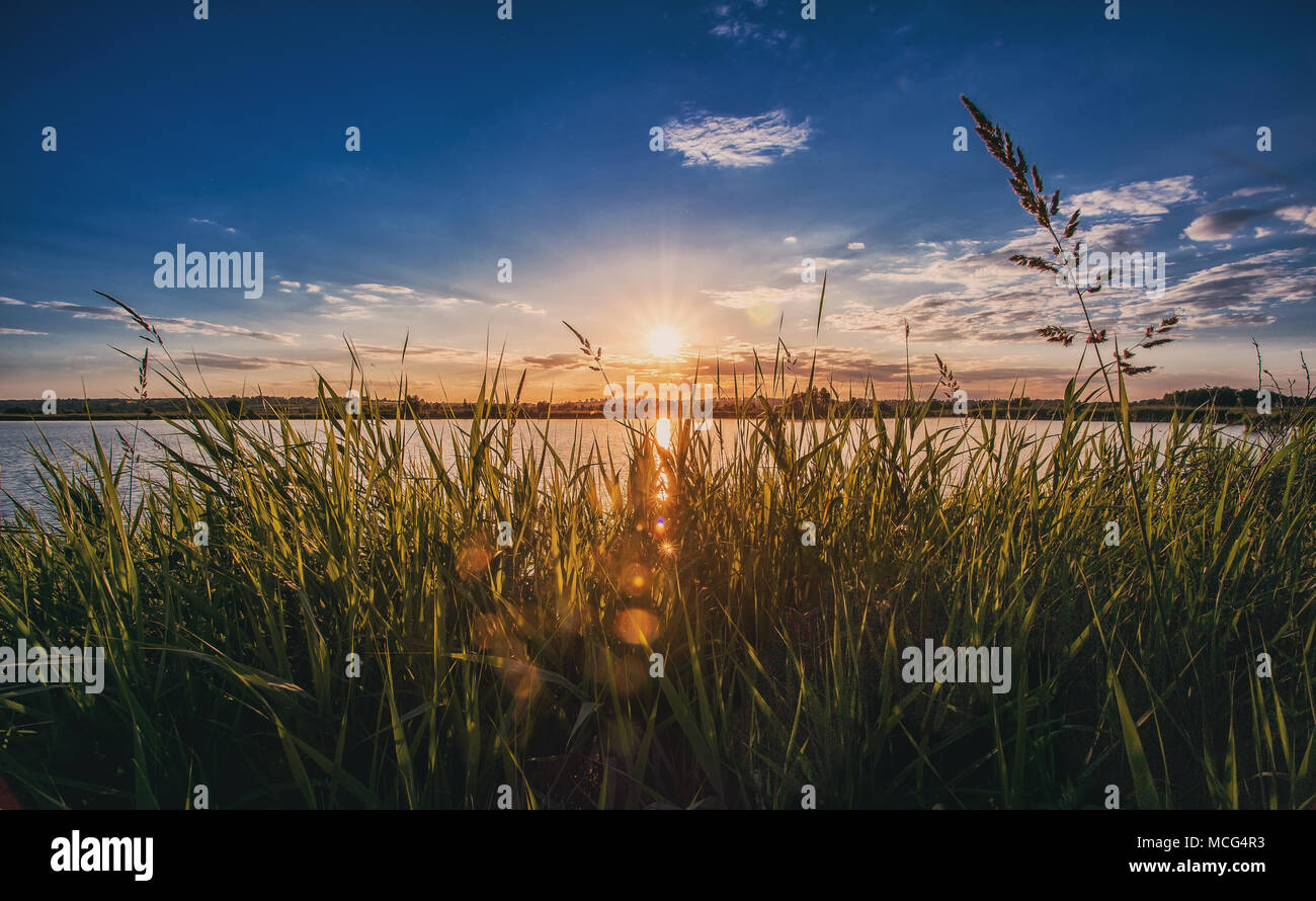 Beautiful summer sunset lake orange hi-res stock photography and images ...