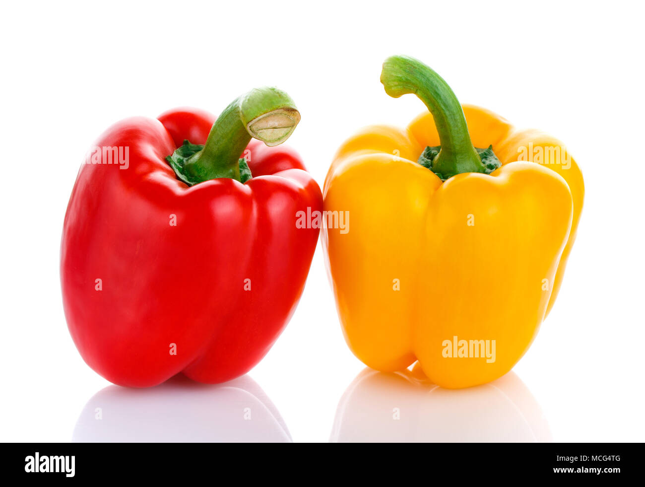 Red and yellow peppers isolated Stock Photo - Alamy