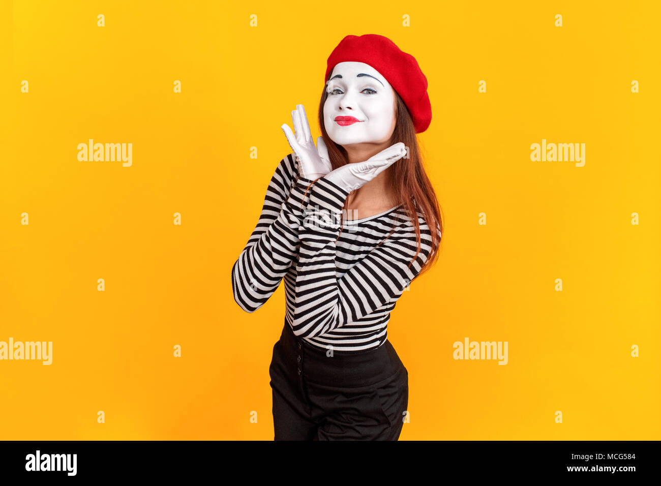 Portrait of cute mime woman showing perfect white skin. Emotions and ...
