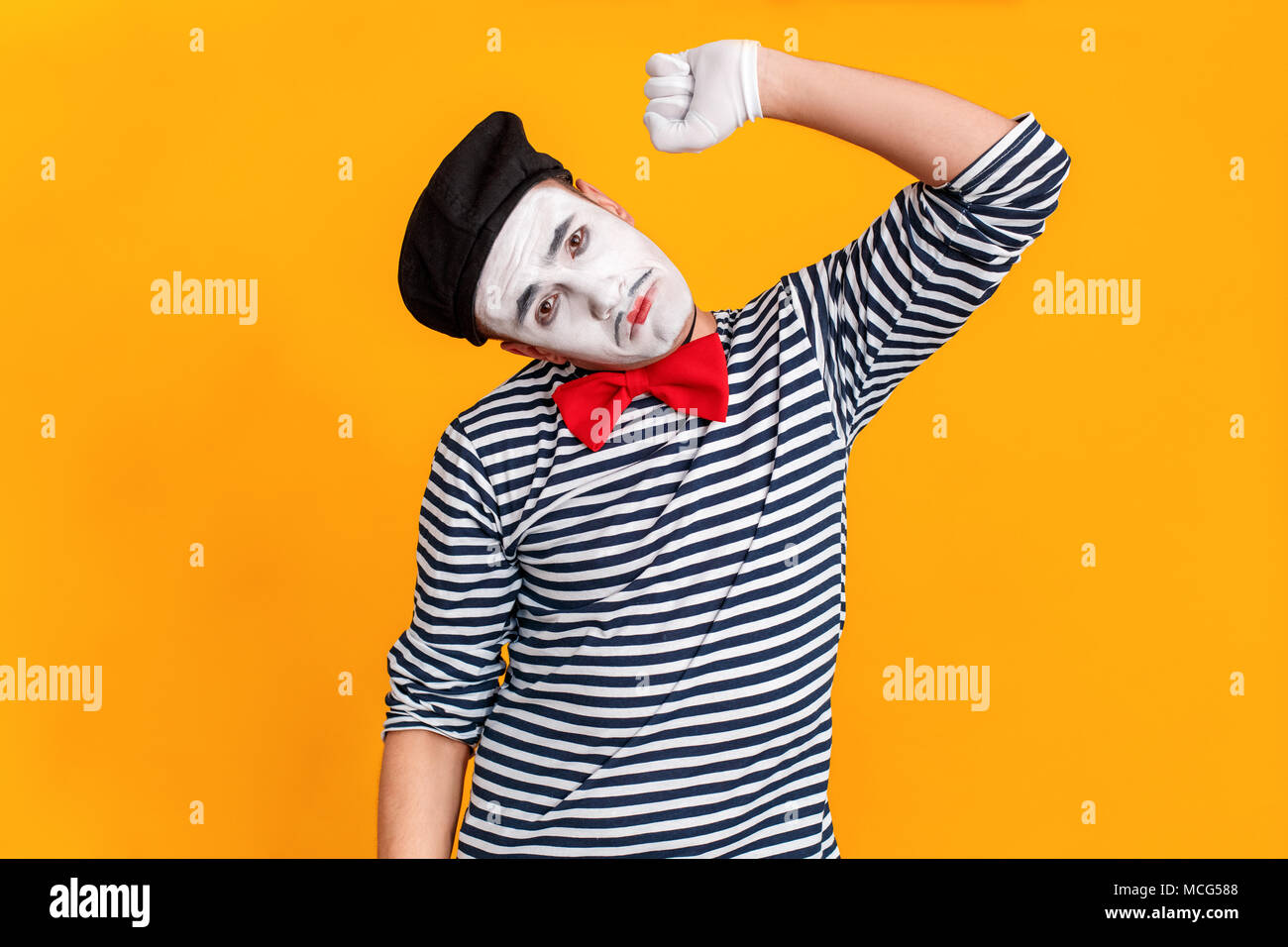 Suicide, bad emotions. Mime man holding rope on his neck. Emotions and ...