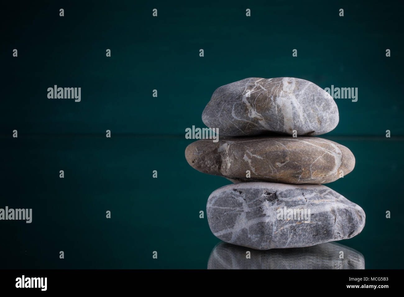 Learn to be mindful - stacked pebbles Stock Photo - Alamy