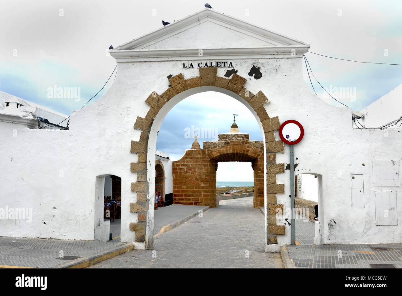 Gate to enter in La Caleta pier, Cadiz, Spain, Spanish Stock Photo - Alamy