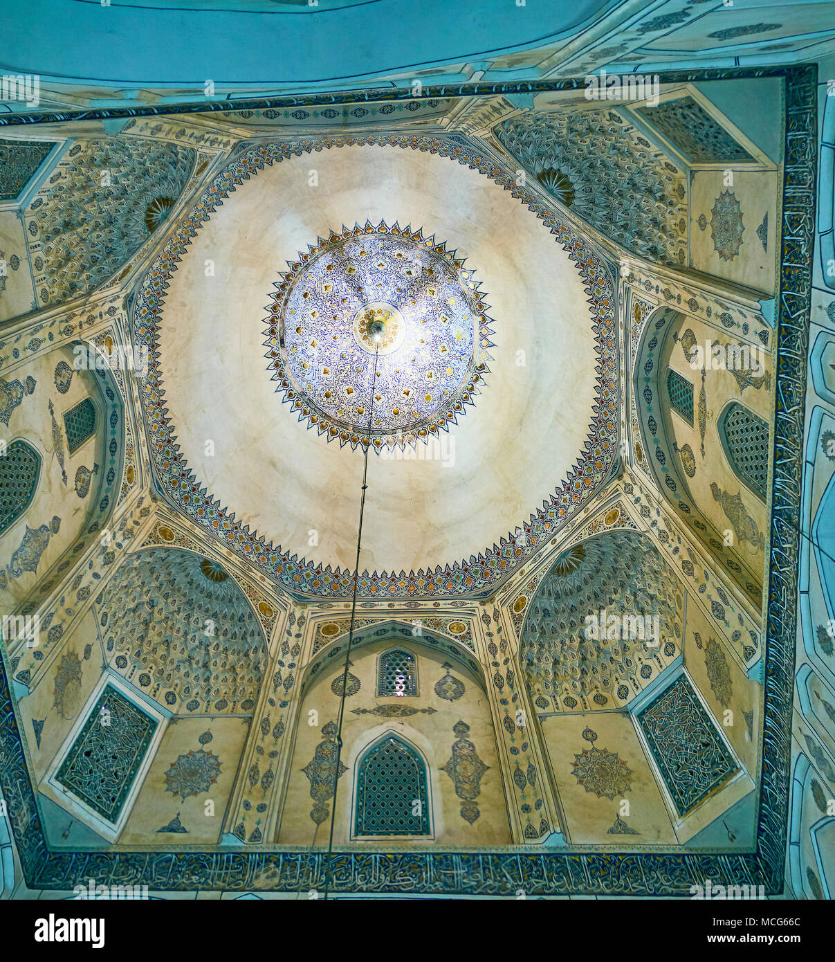 MAHAN, IRAN - OCTOBER 16, 2017: The richly decorated dome of tomb room ...