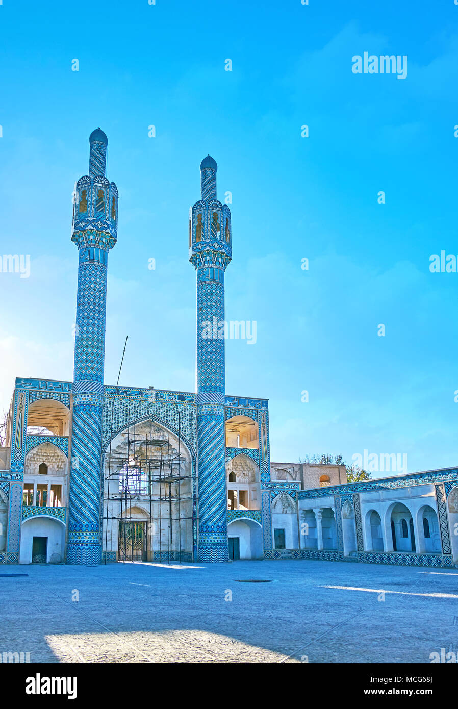 The Hosseiniyeh of Shah Nematollah Vali Shrine with twin minarets of ...