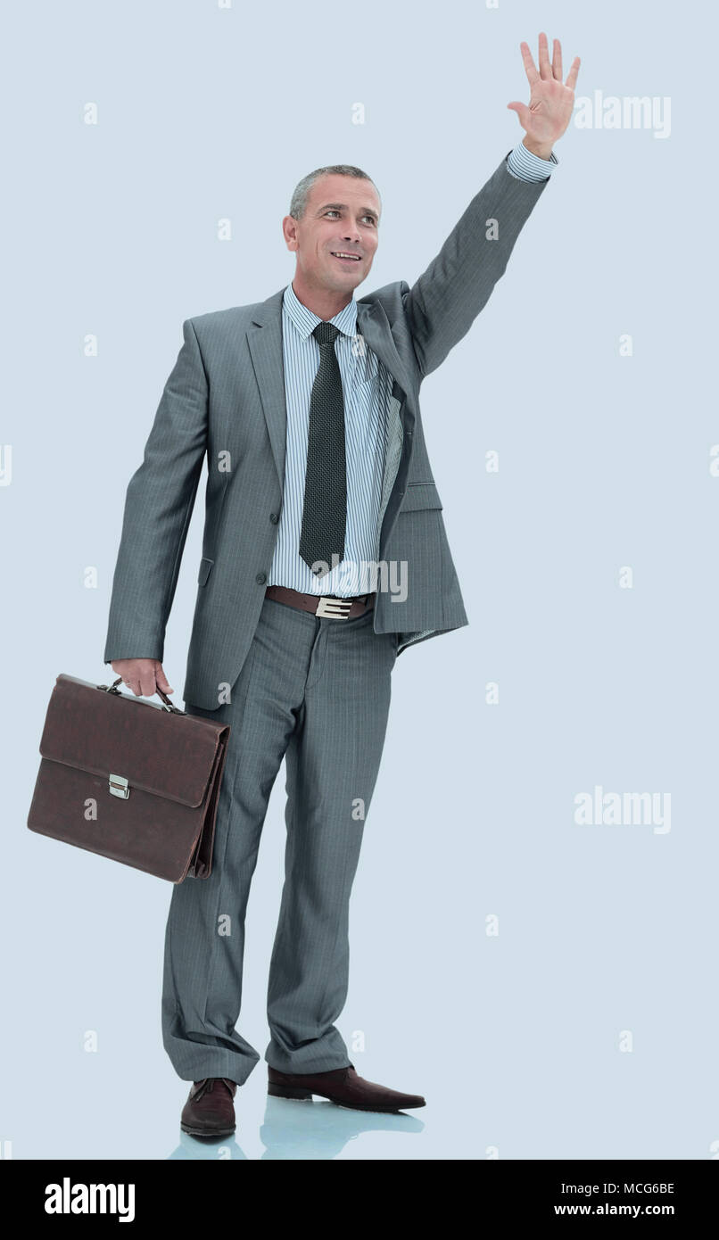 Happy mature man in suit smiling while standing Stock Photo - Alamy