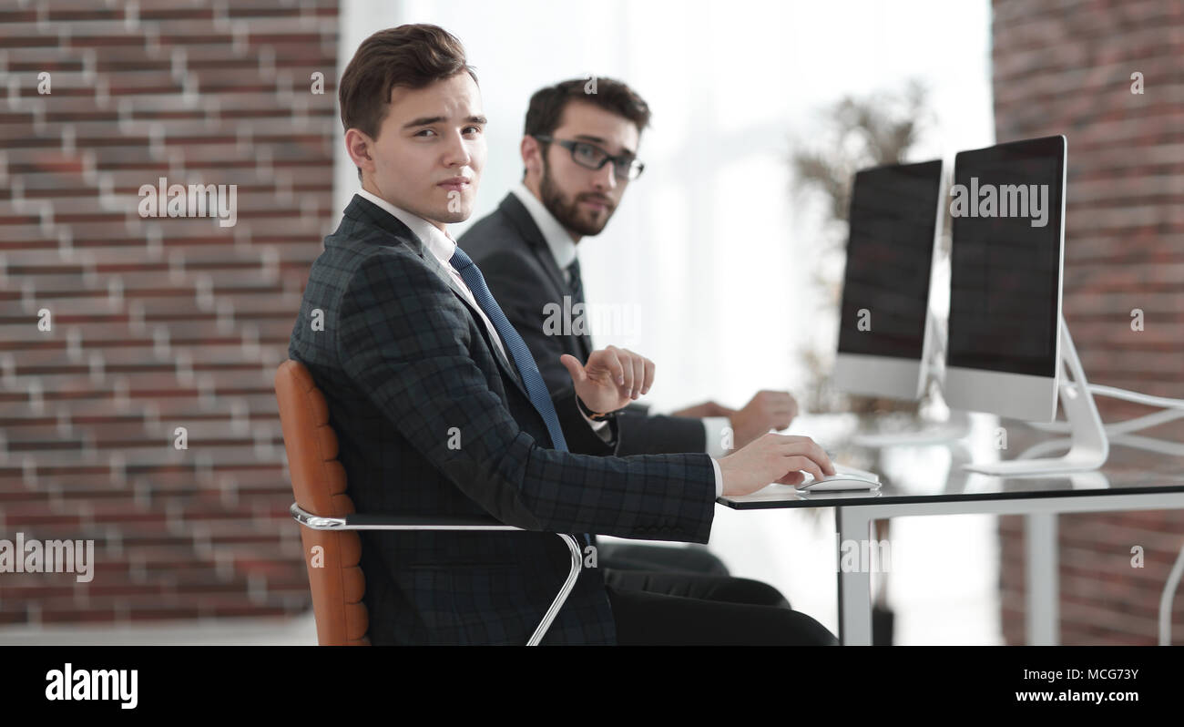 employees work with computers in a modern office Stock Photo - Alamy