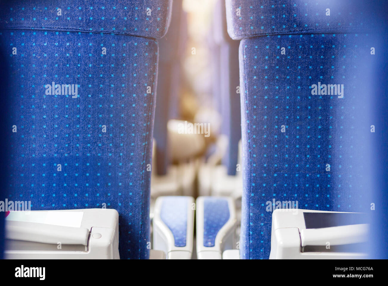 Interior of modern intercity express train. Back view of wide ...