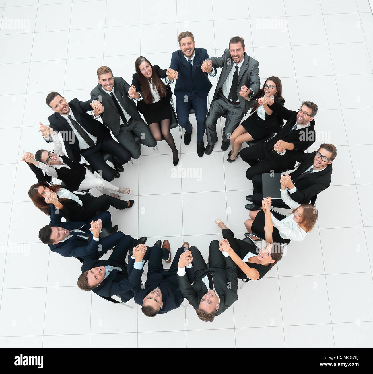 concept of team building .large successful business team sitting in a ...