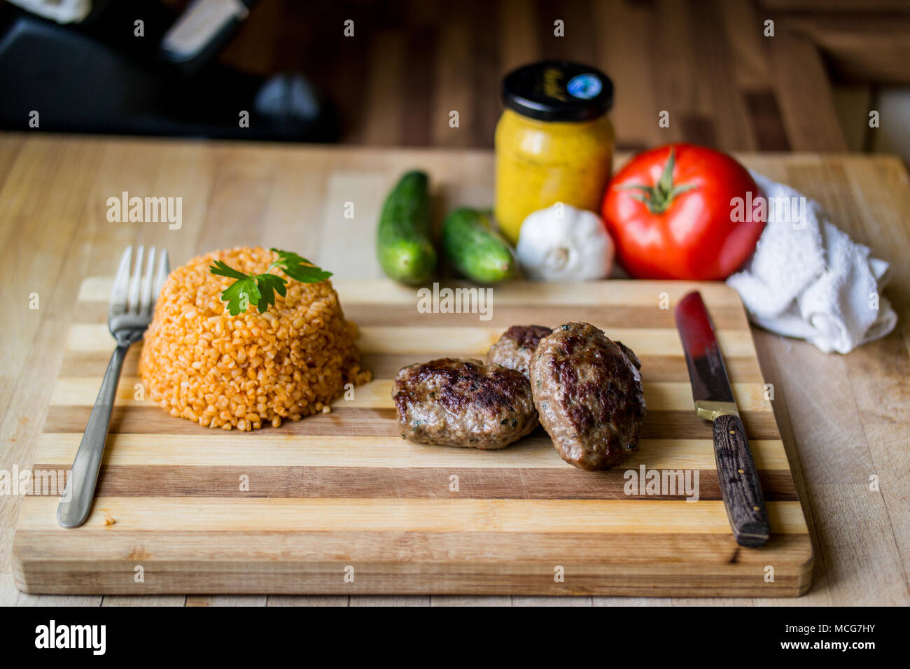 Turkish Meatball Kofte or Kofta with Pliav / Bulgur Pilaf, tomatoes and ...