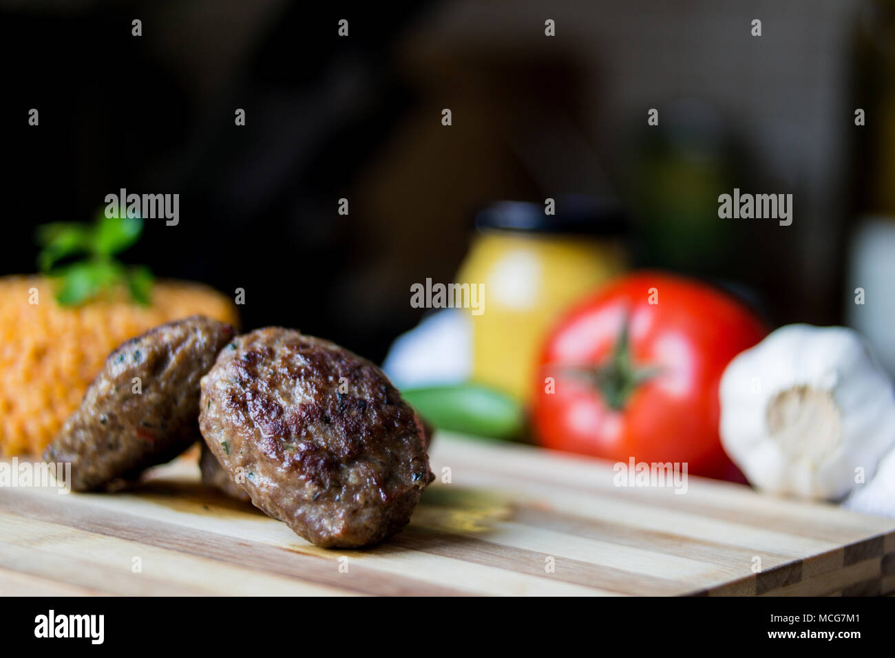 Turkish Meatball Kofte or Kofta with Pliav / Bulgur Pilaf, tomatoes and ...