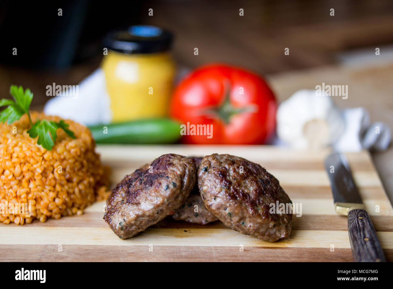 Turkish Meatball Kofte or Kofta with Pliav / Bulgur Pilaf, tomatoes and ...