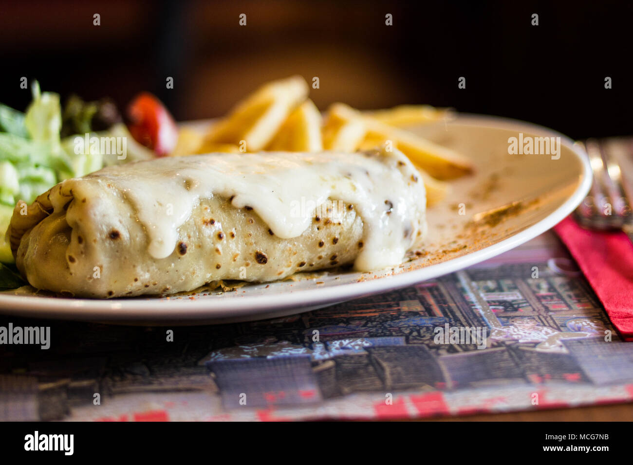 Crepe with cheese, lettuce and French fries Stock Photo - Alamy