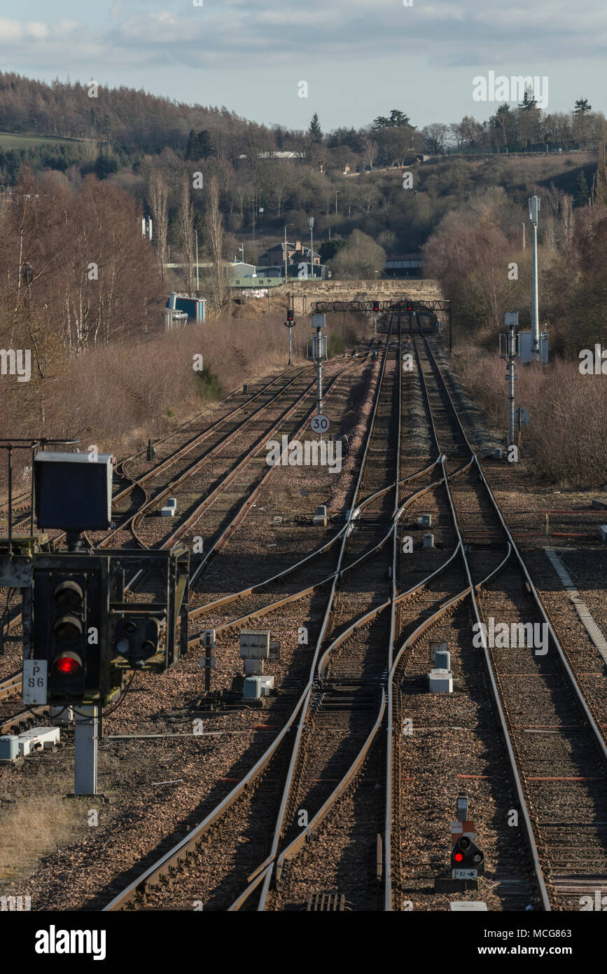The mainline rail track south out of Perth railway station with lights ...