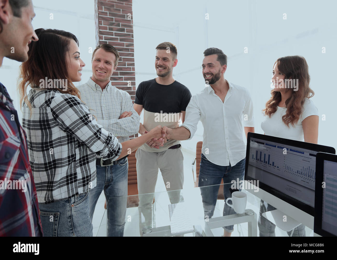 friendly handshake between Manager and employee Stock Photo - Alamy