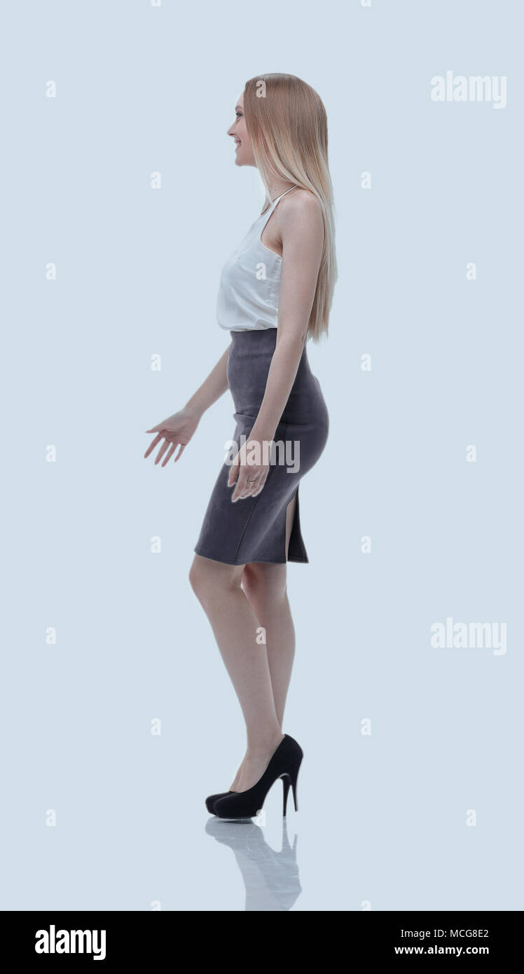 side view. successful business woman is moving forward. photo in full ...