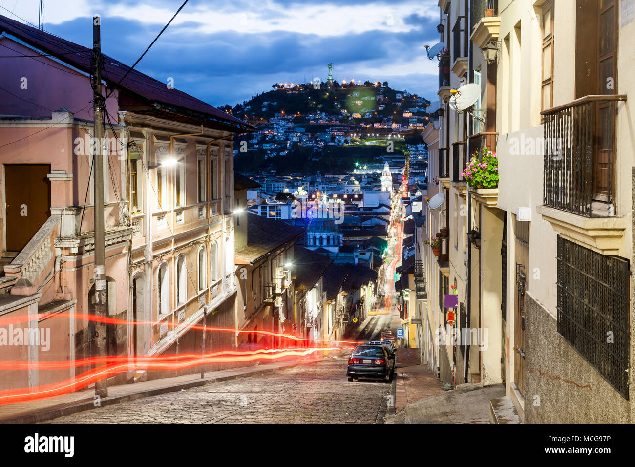 Quito street at sunset, old downtown, Ecuador Stock Photo - Alamy