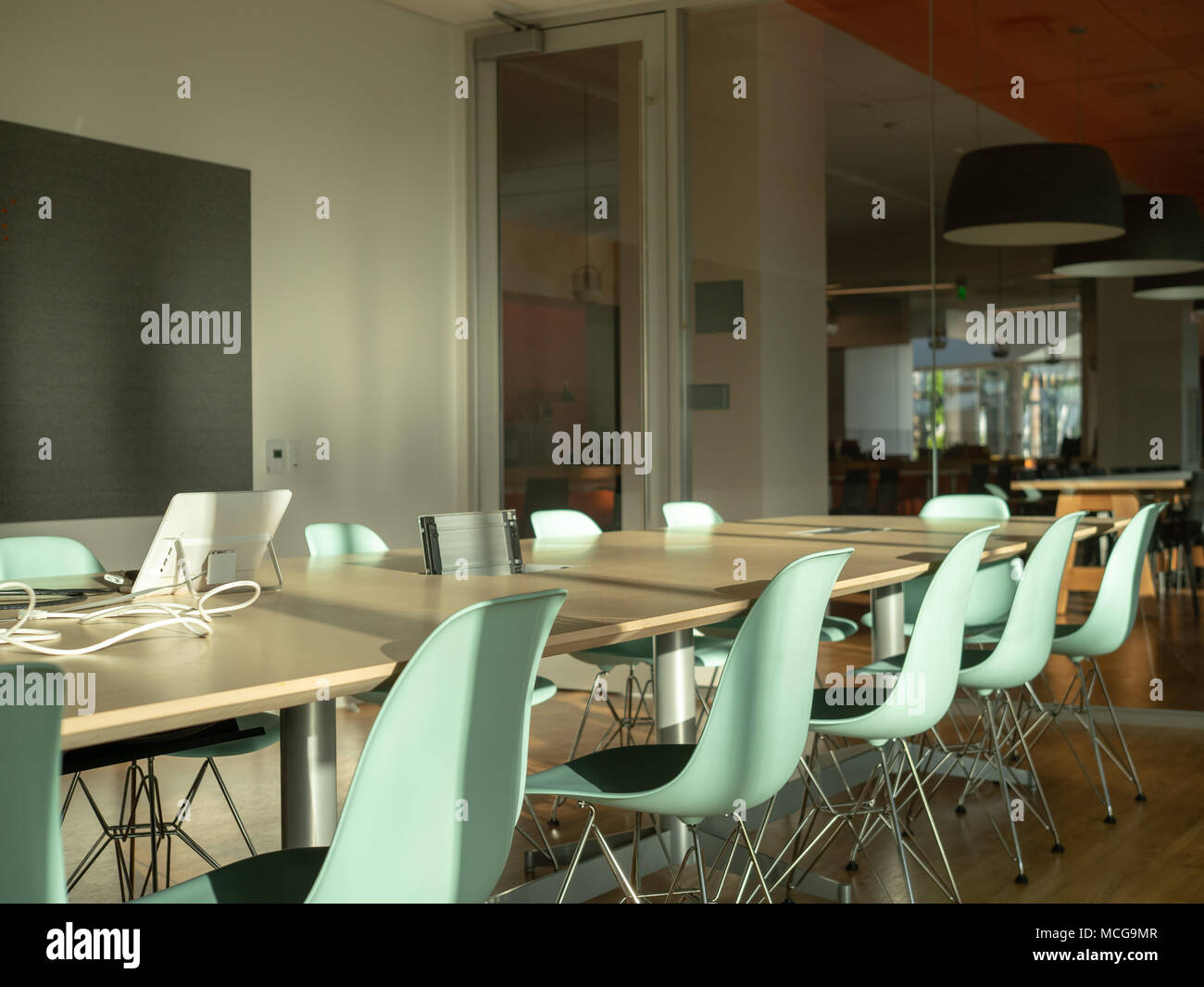 Modern office meeting room with transparent walls and advanced ...