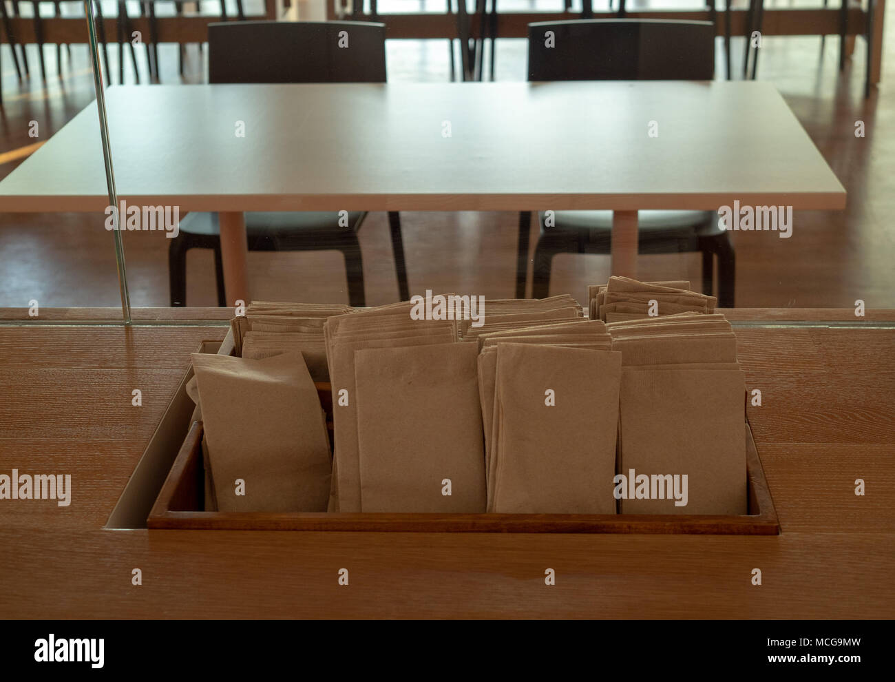 Front view of napkins and paper towels on display in a cafeteria to be ...
