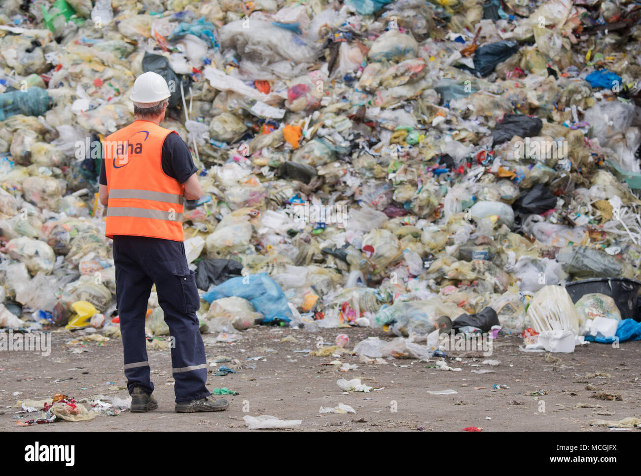 16 April 2018, Germany, Hanover: an employee walking in front of ...